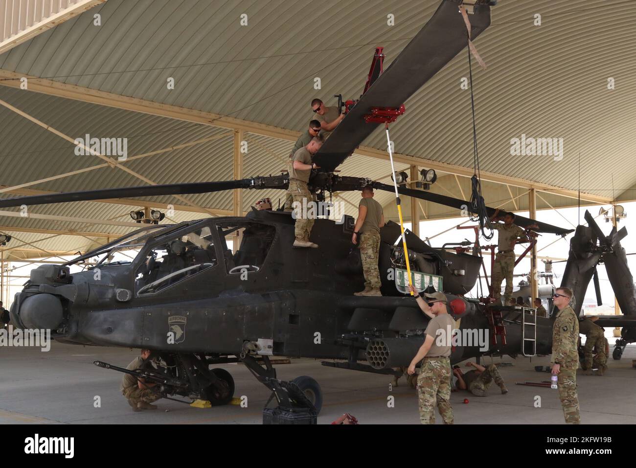Soldiers with the 101st Combat Aviation Brigade prepare to fold the ...