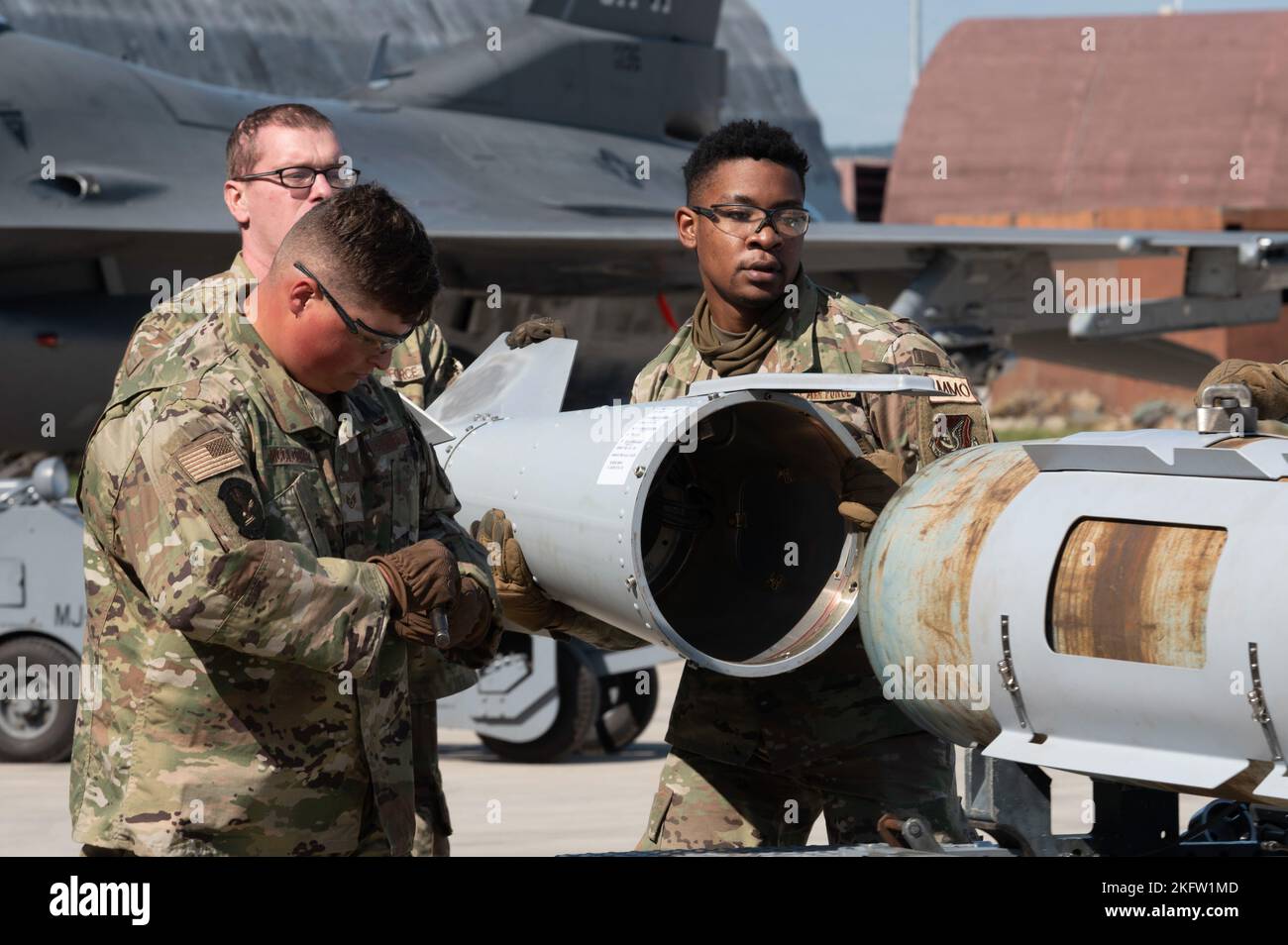 U.S. Air Force Airmen, assigned to the 51st Munitions Squadron ...