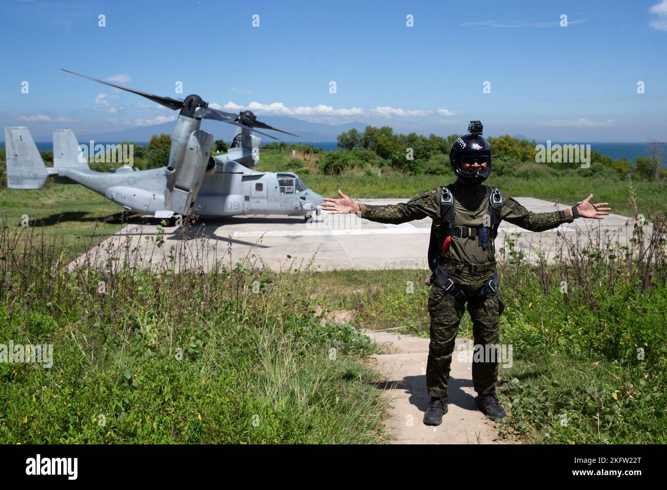 A Philippine reconnaissance Marine poses in front of a U.S. Marine ...