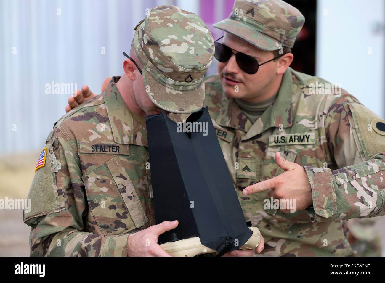 U.S. Army Pfc. Jordan Stalter, left, assigned to Bravo Company, 1st ...