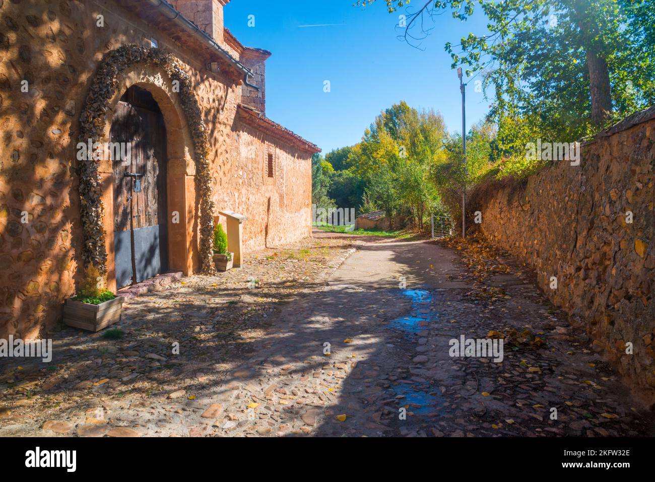 Church and way. Saldaña de Ayllon, Segovia province, Castilla leon ...