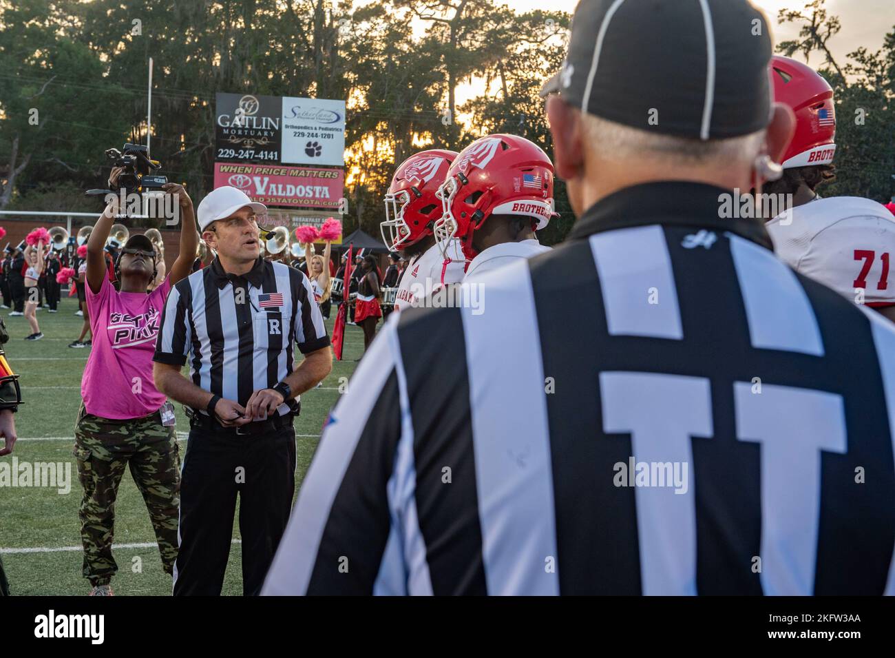 Collegiate football referees prepare team captains for the official ...