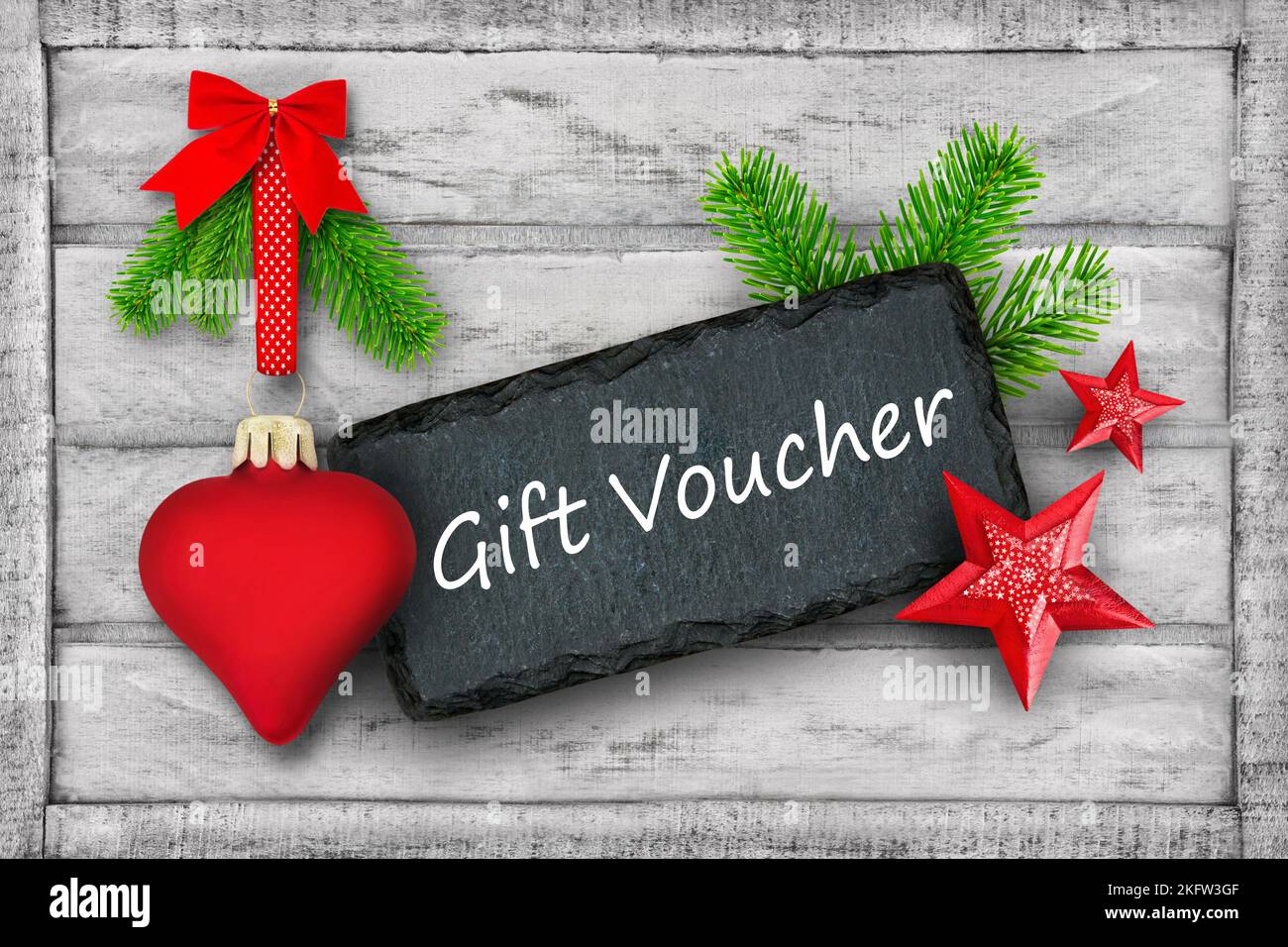 Red Christmas decoration with Gift Voucher, heart, label and fir ...