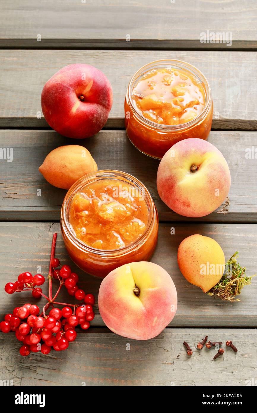 Peach jam and fruits. Healthy food Stock Photo - Alamy