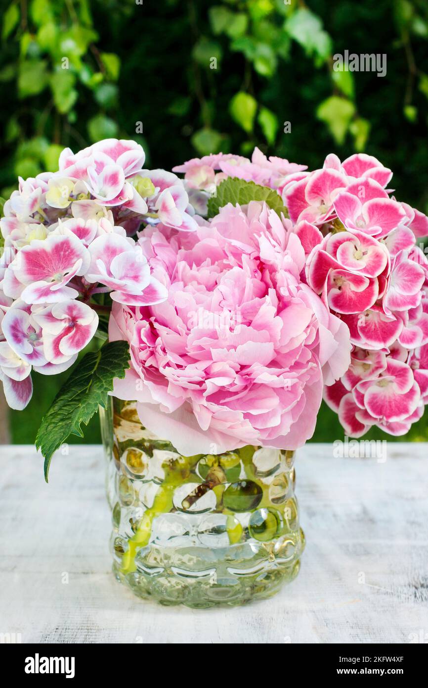 Bouquet of hortensia (Hydrangea macrophylla) and peony flowers. Party ...