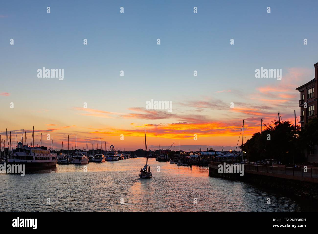 New York, SEP 12 2014 - Sunset view of the Liberty Landing Marina Stock ...