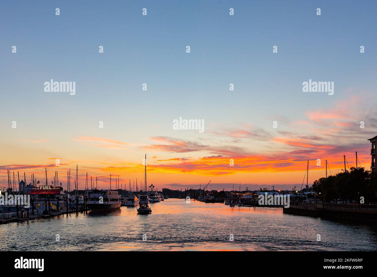 New York, SEP 12 2014 - Sunset view of the Liberty Landing Marina Stock ...
