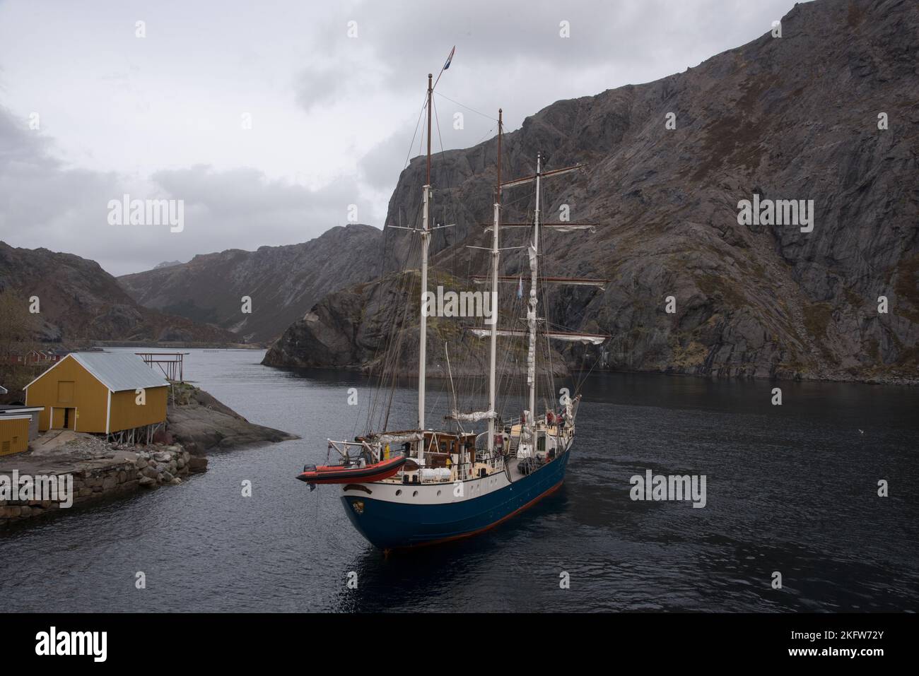 Barquentine Antigua entering Nusfjord harbour which is a tiny and ...