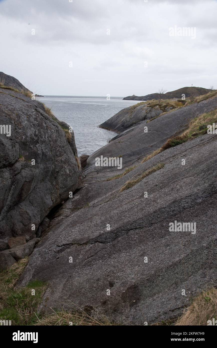 Granite rock coast just out of Nusfjord which is a tiny and pictoresque ...