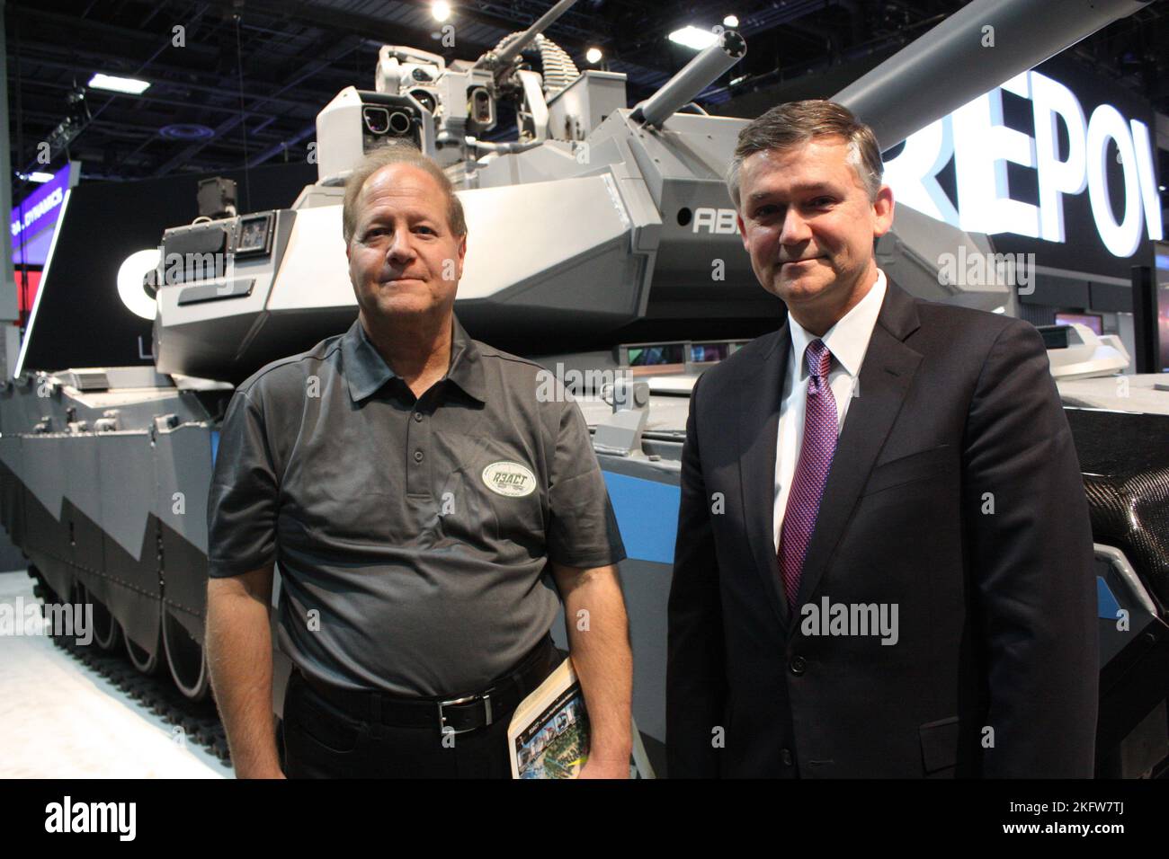 At right, Douglas R. Bush, Assistant Secretary of the Army for ...