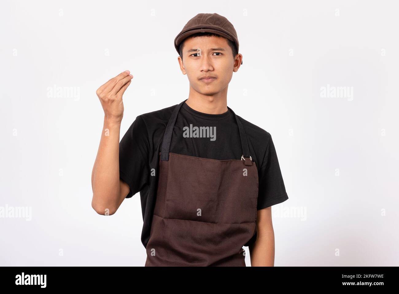 handsome barista asian man wearing brown apron and black t-shirt ...