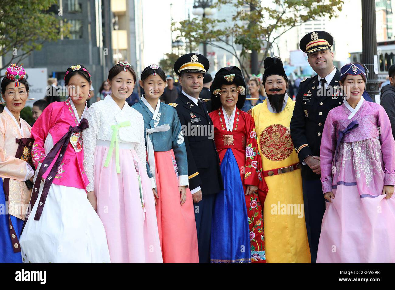 Korean Americans, dressed in traditional clothing, pause for a photo ...