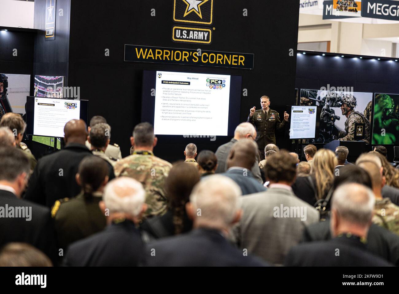 Brigadier General Guy Jones, FCC, Deputy Director, speaks to audience members about Project ...