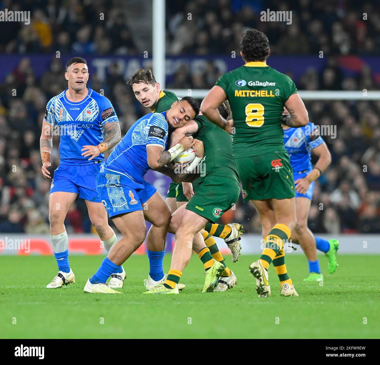 Manchester ENGLAND - NOVEMBER 19. Spencer Leniu of Samoa tries to keep ...