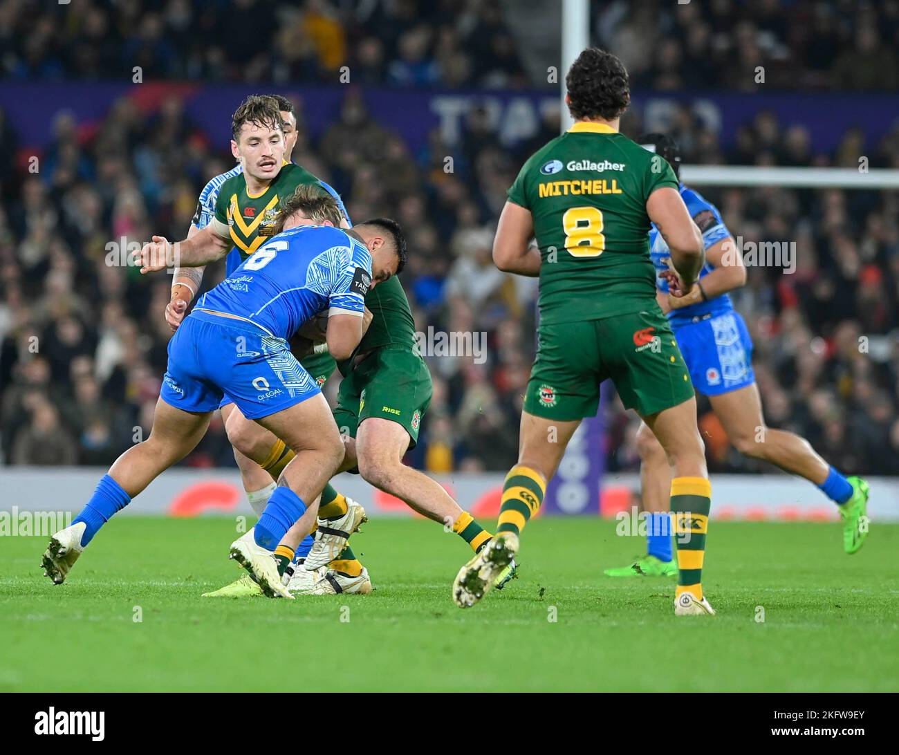 Manchester ENGLAND - NOVEMBER 19. Spencer Leniu of Samoa tries to keep ...