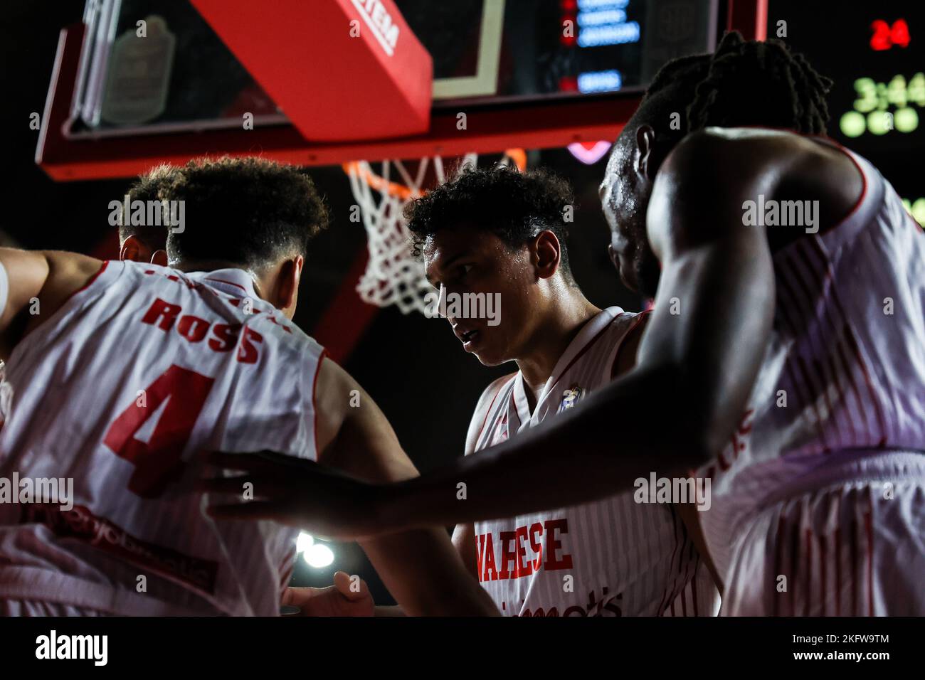 Justin Reyes #12 of Pallacanestro Varese OpenJobMetis talks to Colbey ...