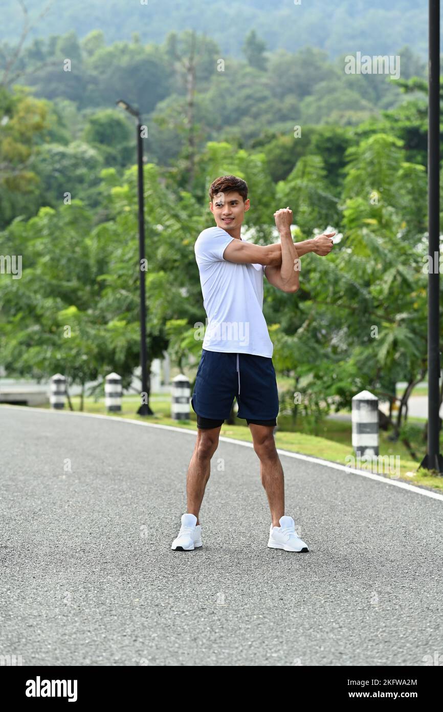 Handsome man looking back running hi-res stock photography and images ...