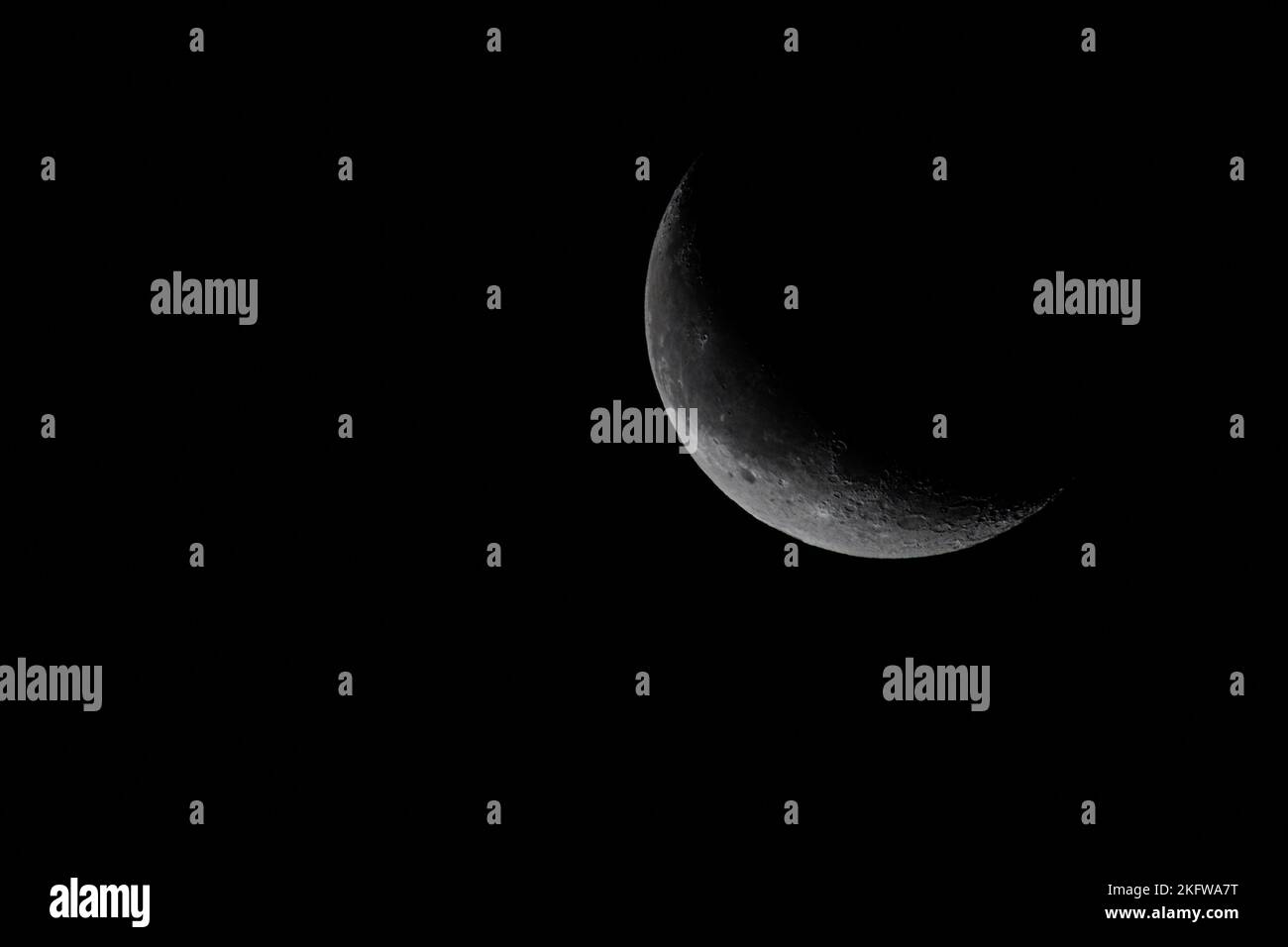 a close up of the waning crescent moon Stock Photo - Alamy