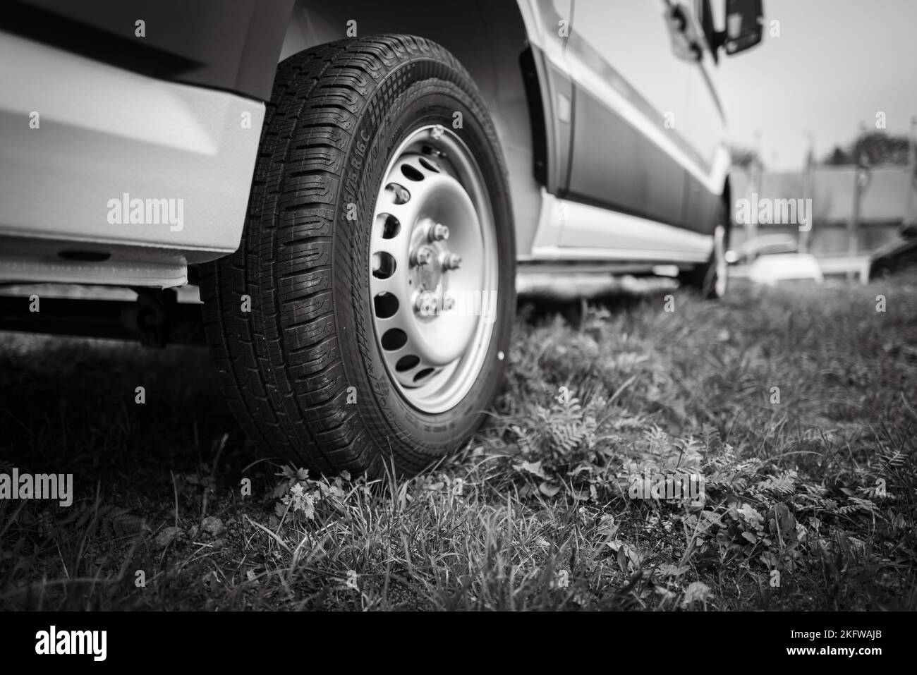 a close up of a transporter wheel in black an white Stock Photo - Alamy