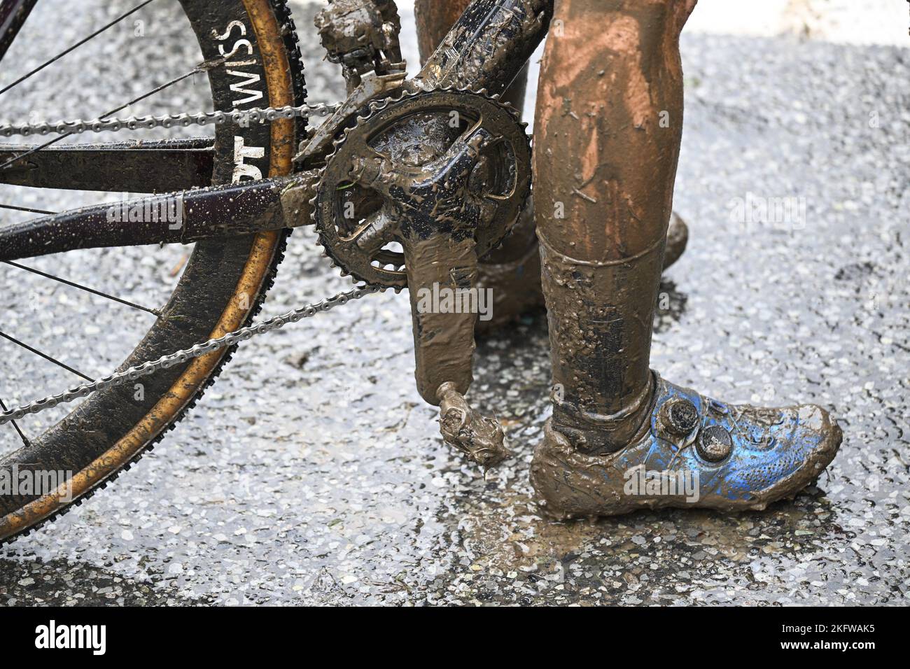 The muddy leg and shoe of a rider pictured after the women's elite race ...