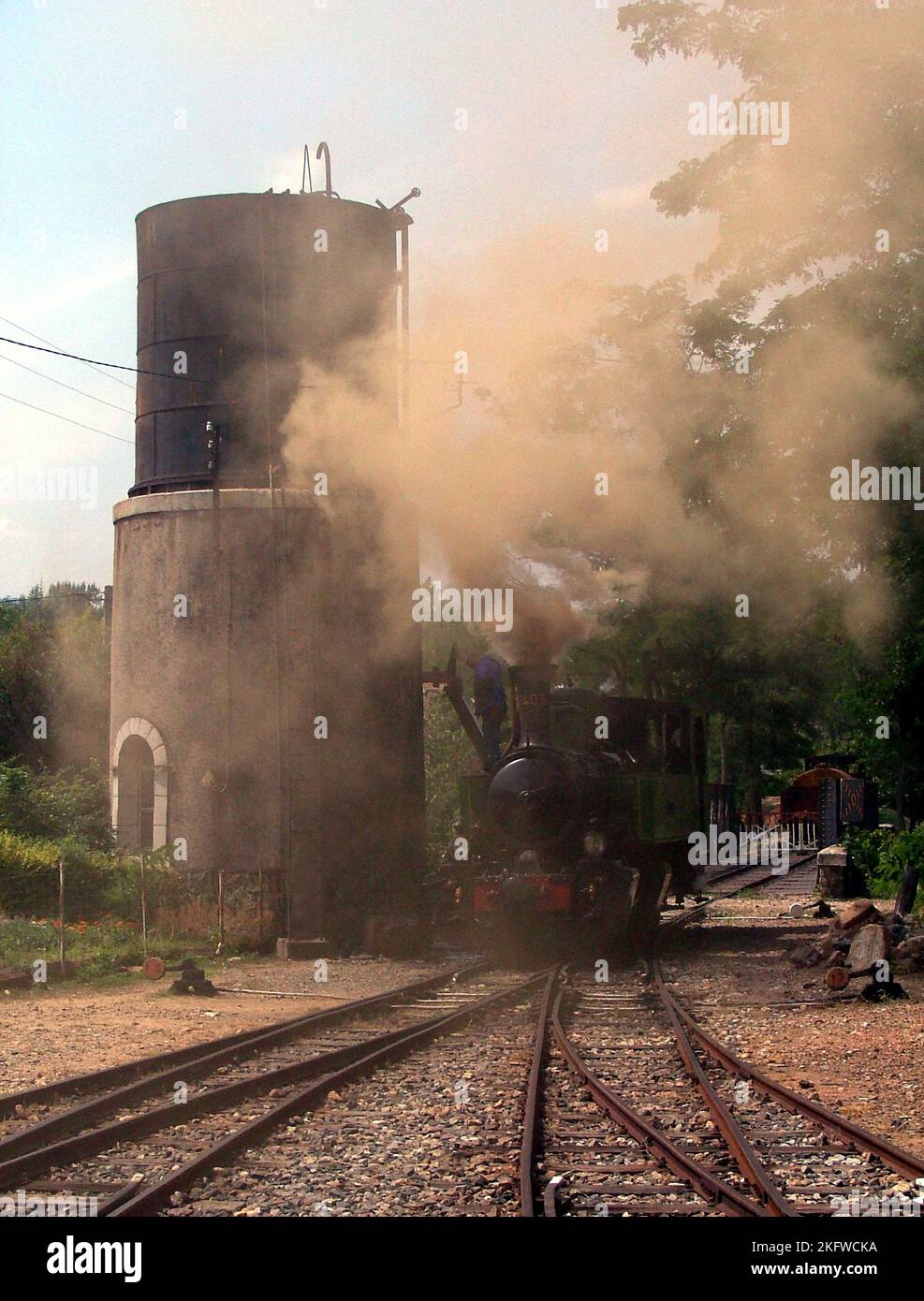 The stoker feeds the boiler fire to increase the pressure and a ...