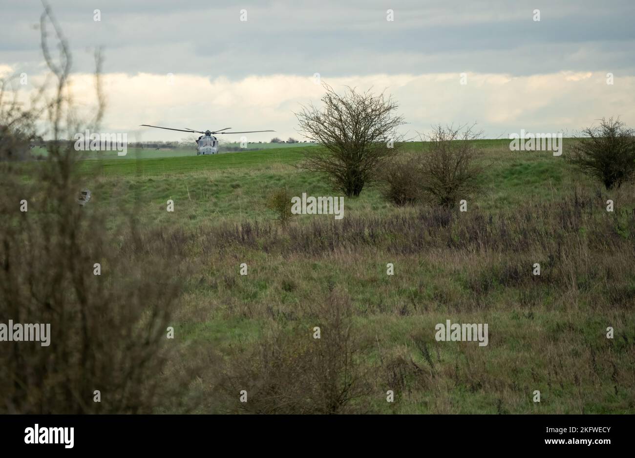 British army AgustaWestland AW159 Wildcat AH1 helicopter flying low ...