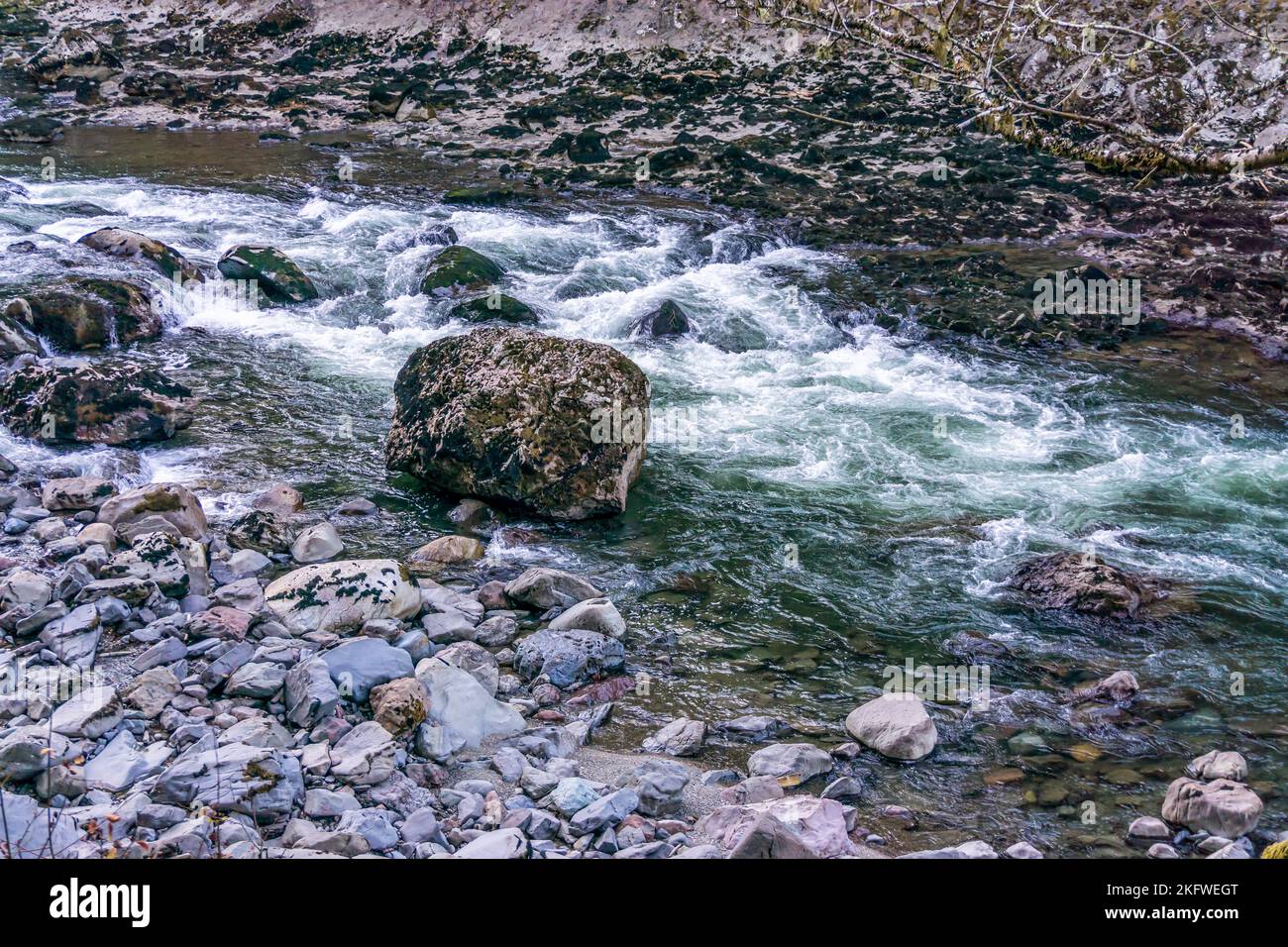 Snoqualmie River rapids surronded by rocks and boulders Stock Photo - Alamy