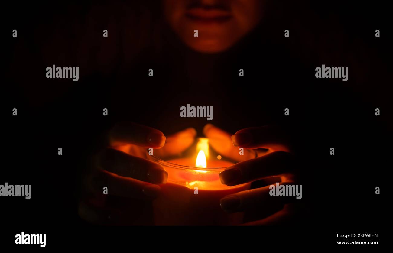 The candle warms hi-res stock photography and images - Alamy
