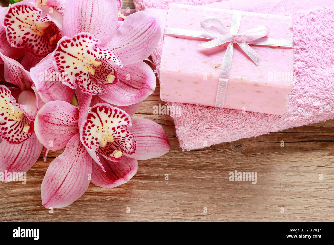 Bar of handmade natural soap and orchid flowers. Spa concept Stock ...