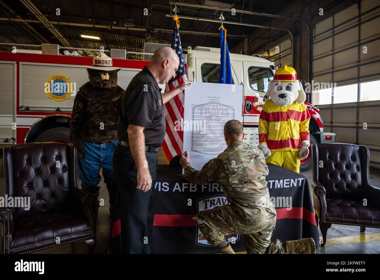 U.S. Air Force Col. Derek Salmi, right, 60th Air Mobility Wing ...