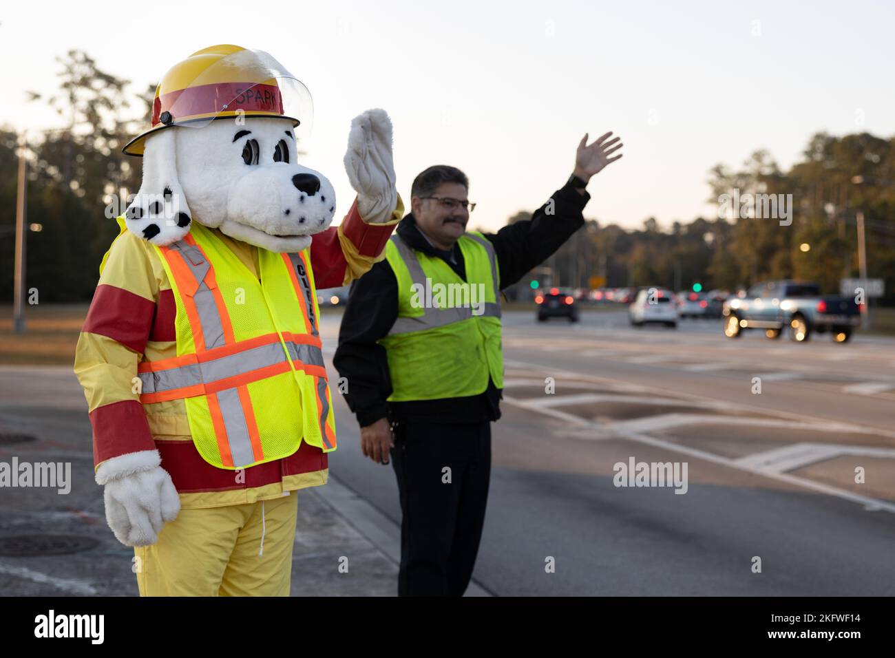 Peter Dyba, left, a fire inspector and mascot, and Ty Steele, right, a ...