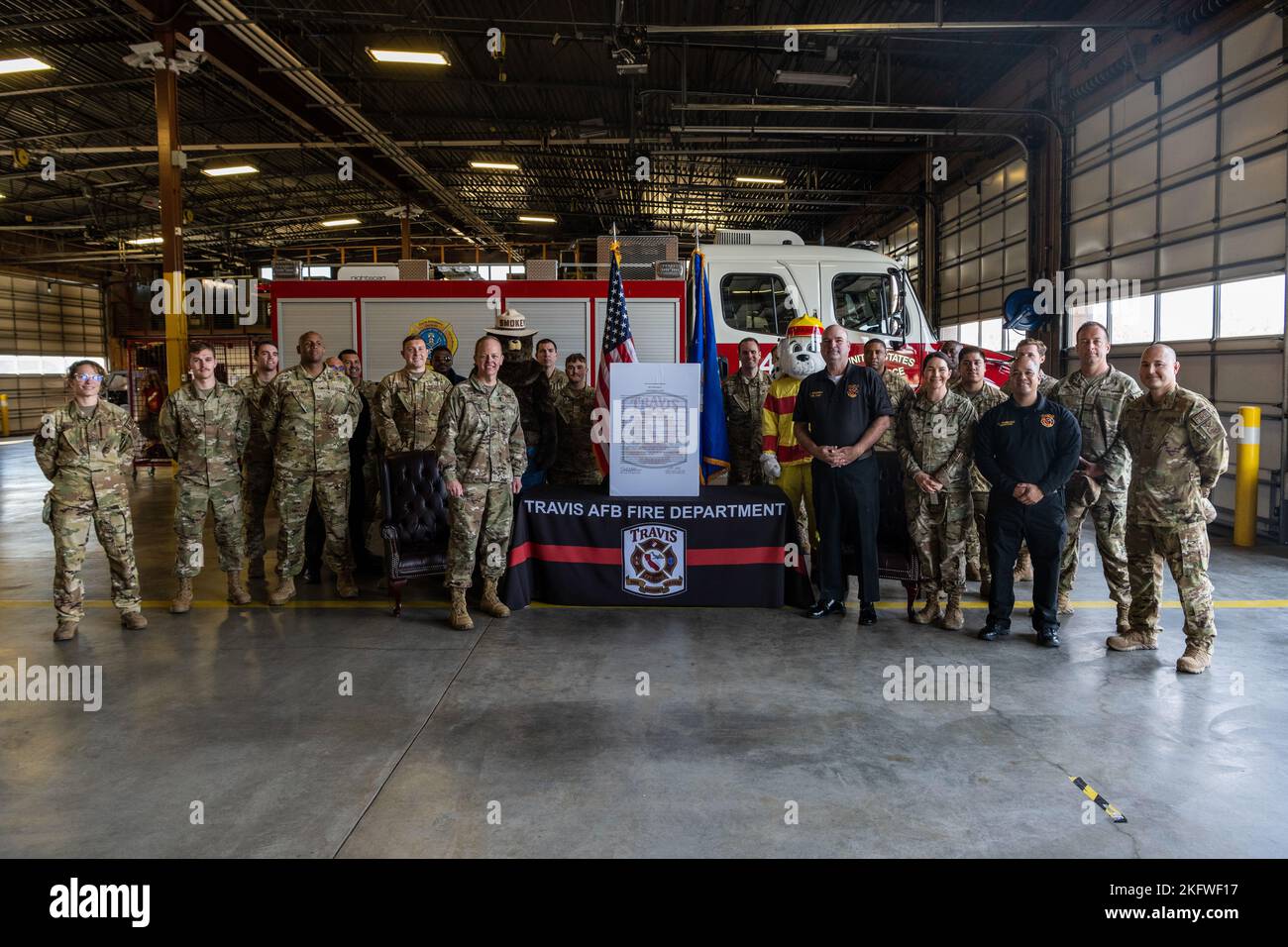 U.S. Airmen from the 60th Civil Engineer Squadron stand with 60th Air ...