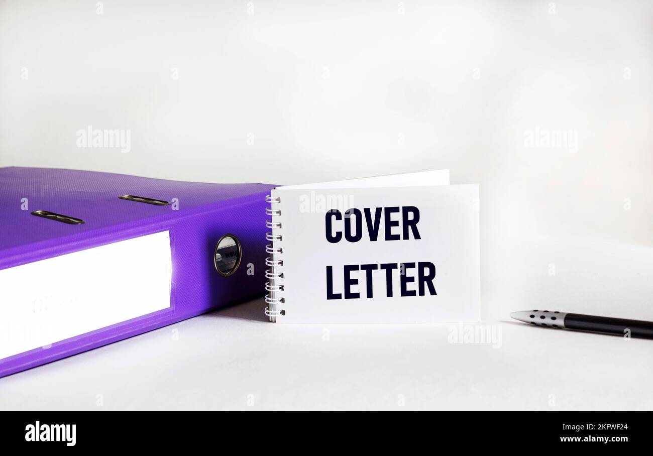 Cover letter text concept on notepad and white background with document ...