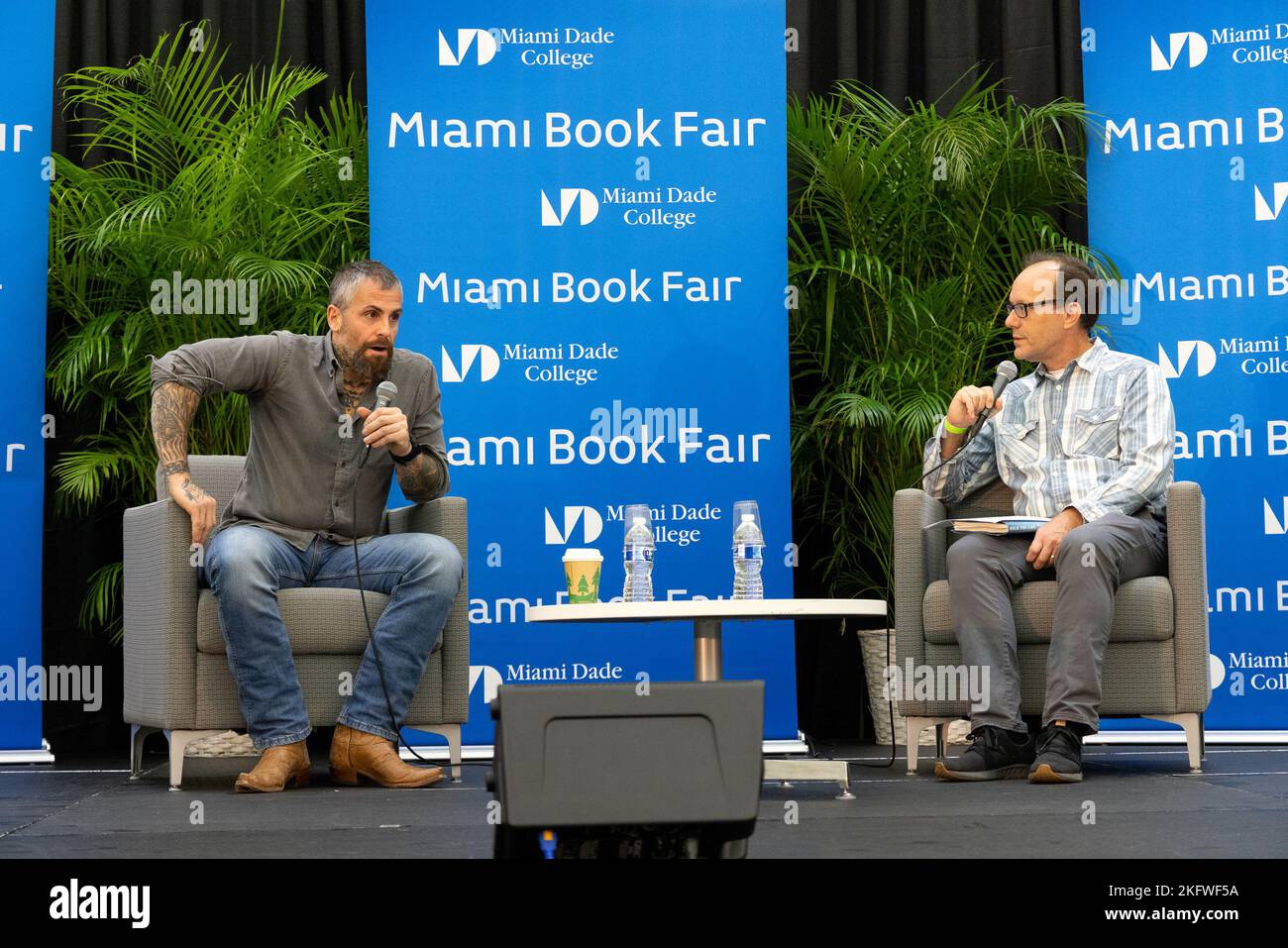 MIAMI, Fl-NOV19: Michael Fanone and journalist Tom Hudson are seen ...