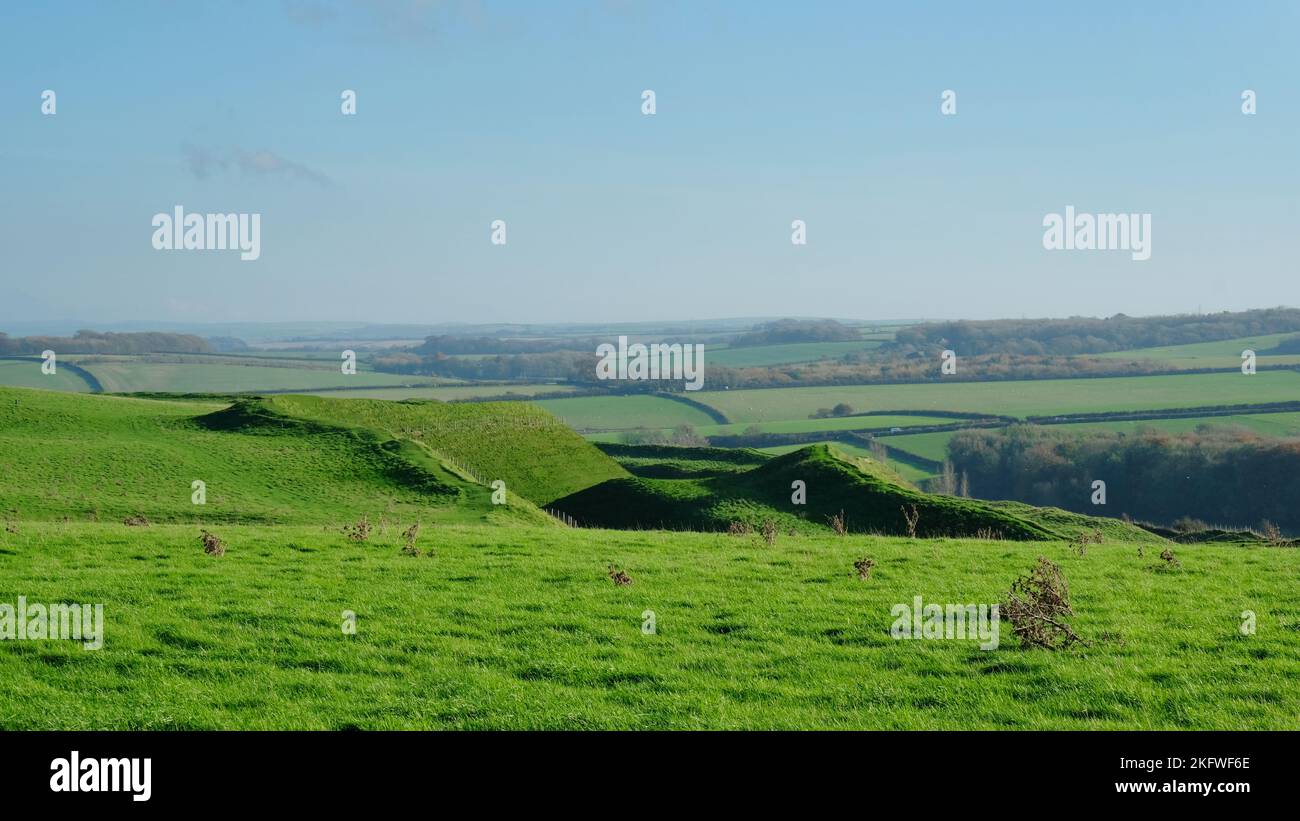 Ditches and ramparts at Maiden Castle, Dorset. Maiden Castle is ...