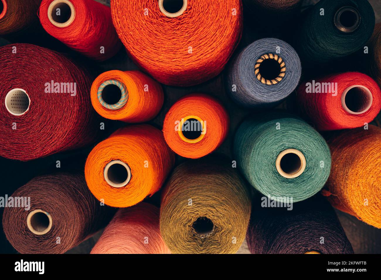 Composition of colorful vibrant wool threads from above. Autumn colours ...