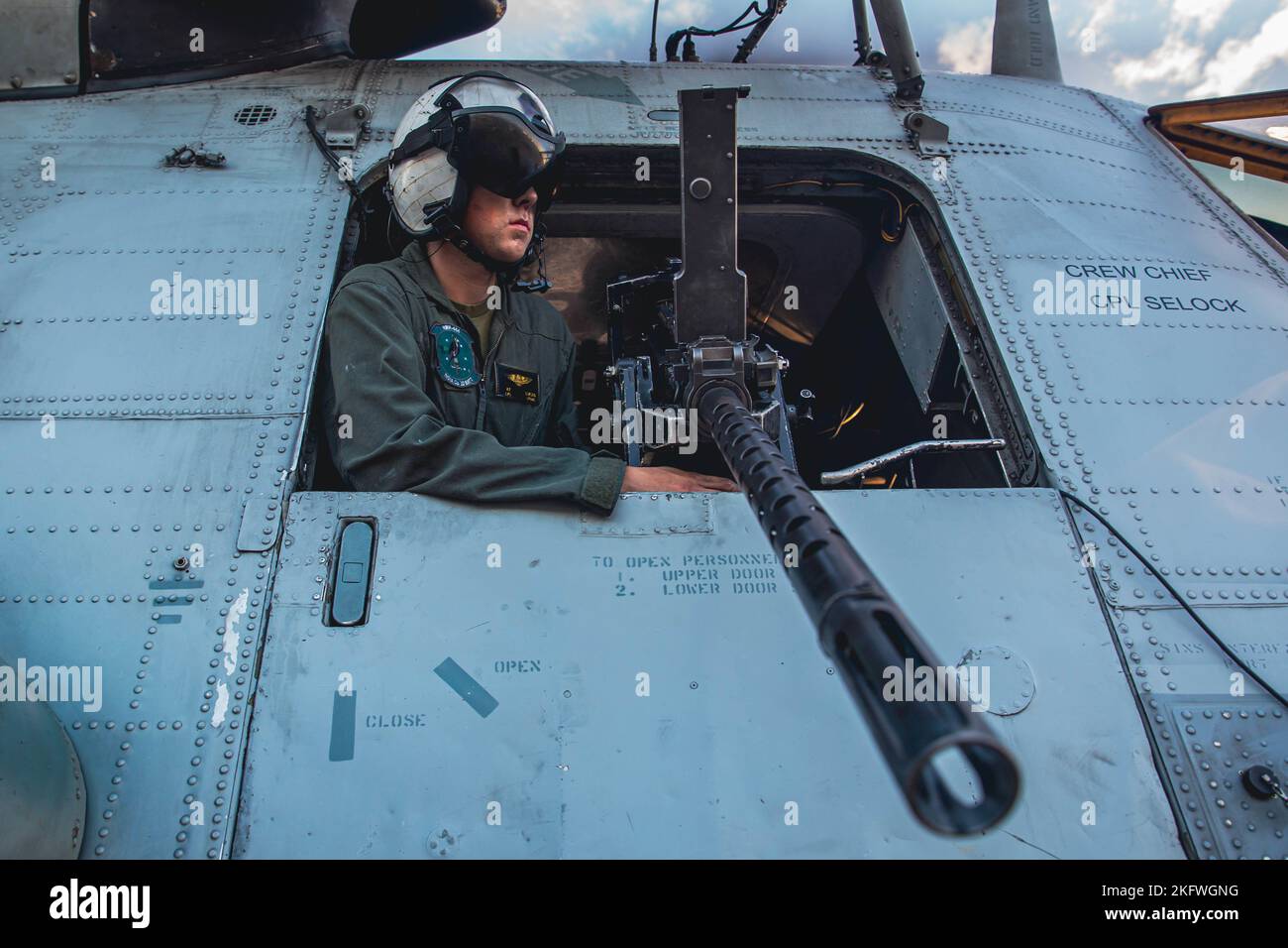 U.S. Marine Corps Cpl. Aaron Lucas, a CH-53E Super Stallion crew chief ...