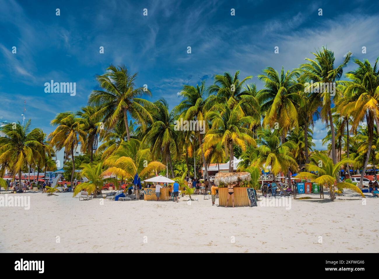Cocos beach bar on a beach with white sand and palms on a sunny day ...