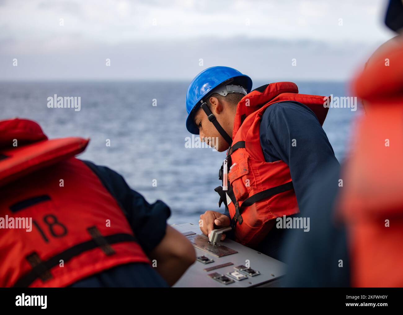 Boatswain’s Mate 3rd Class Elvin Rivera Perez, assigned to the Arleigh ...