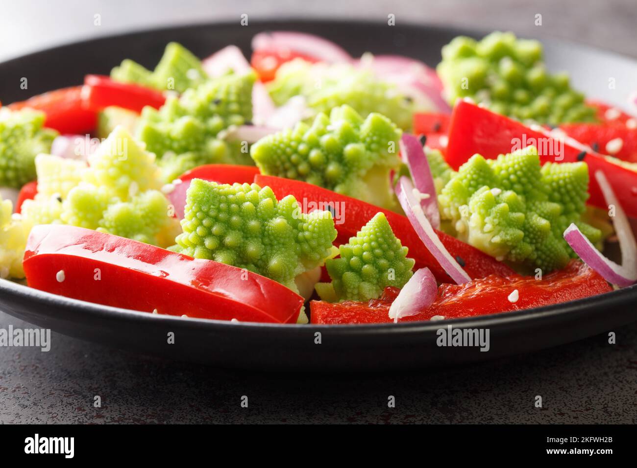 Vegetable vegan salad of Romanesco broccoli, bell pepper and red onion ...