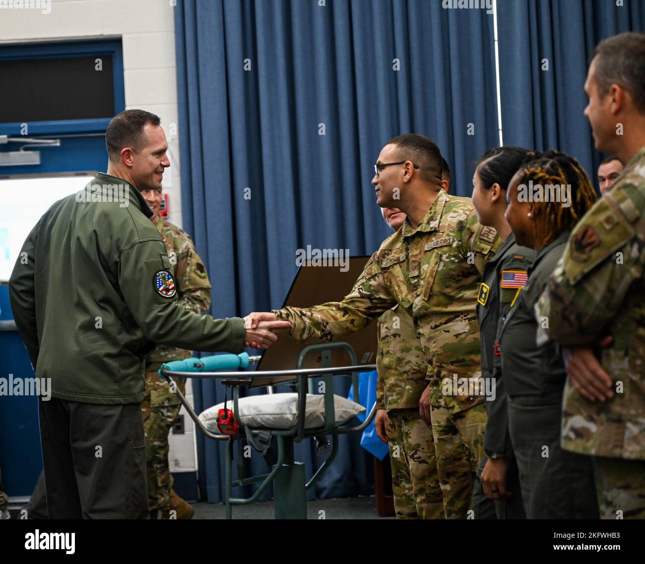 U.S. Air Force Col. William Creeden, 1st Fighter Wing commander, greets ...