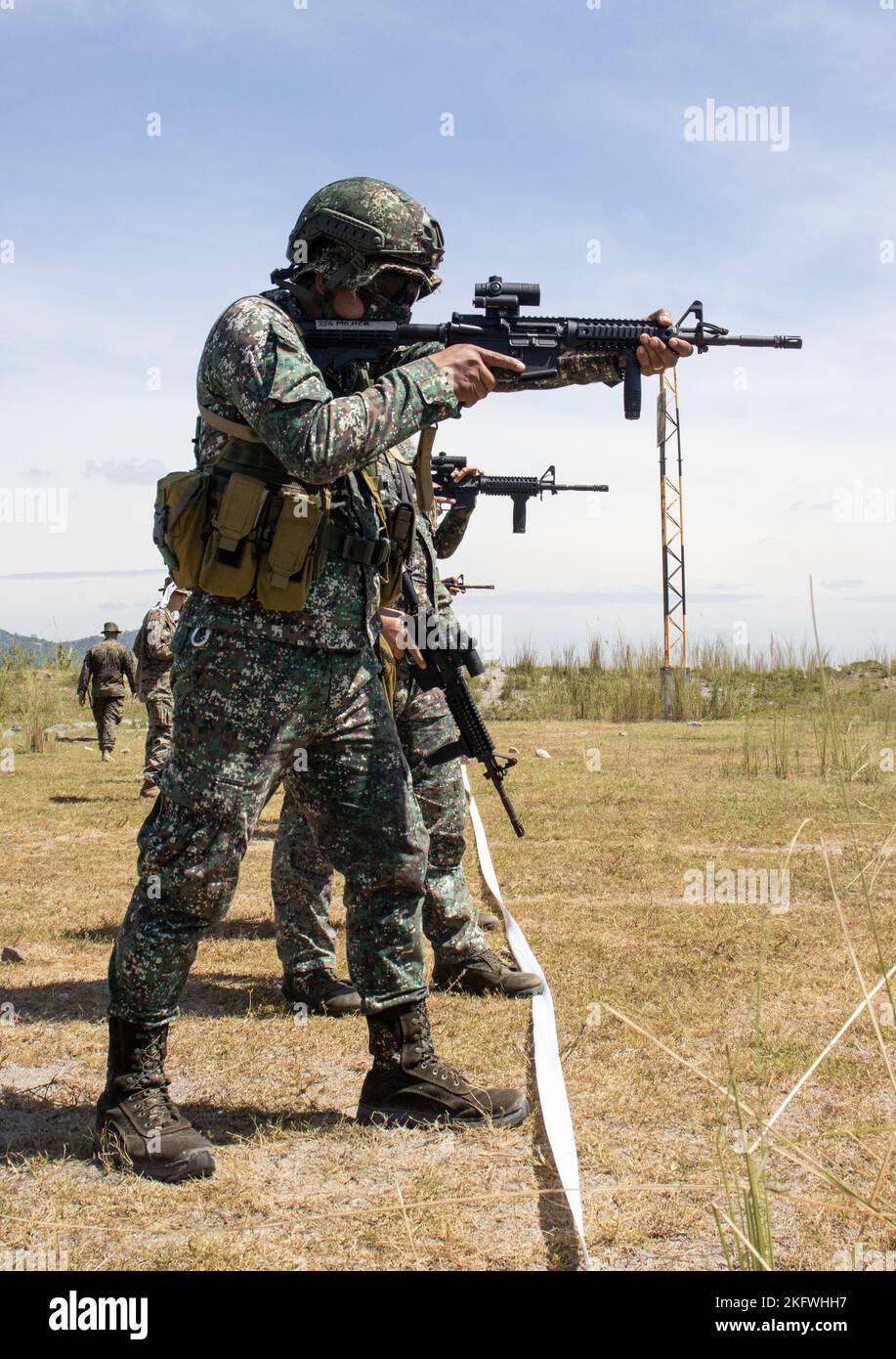 Philippine Marines prepare to fire their rifles during a combined-arms ...