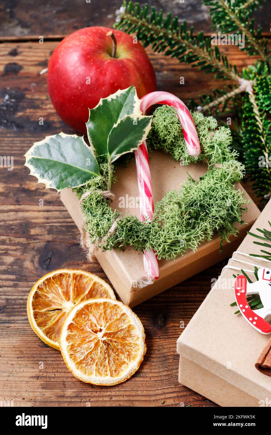 Wrapping christmas presents. Festive time Stock Photo - Alamy