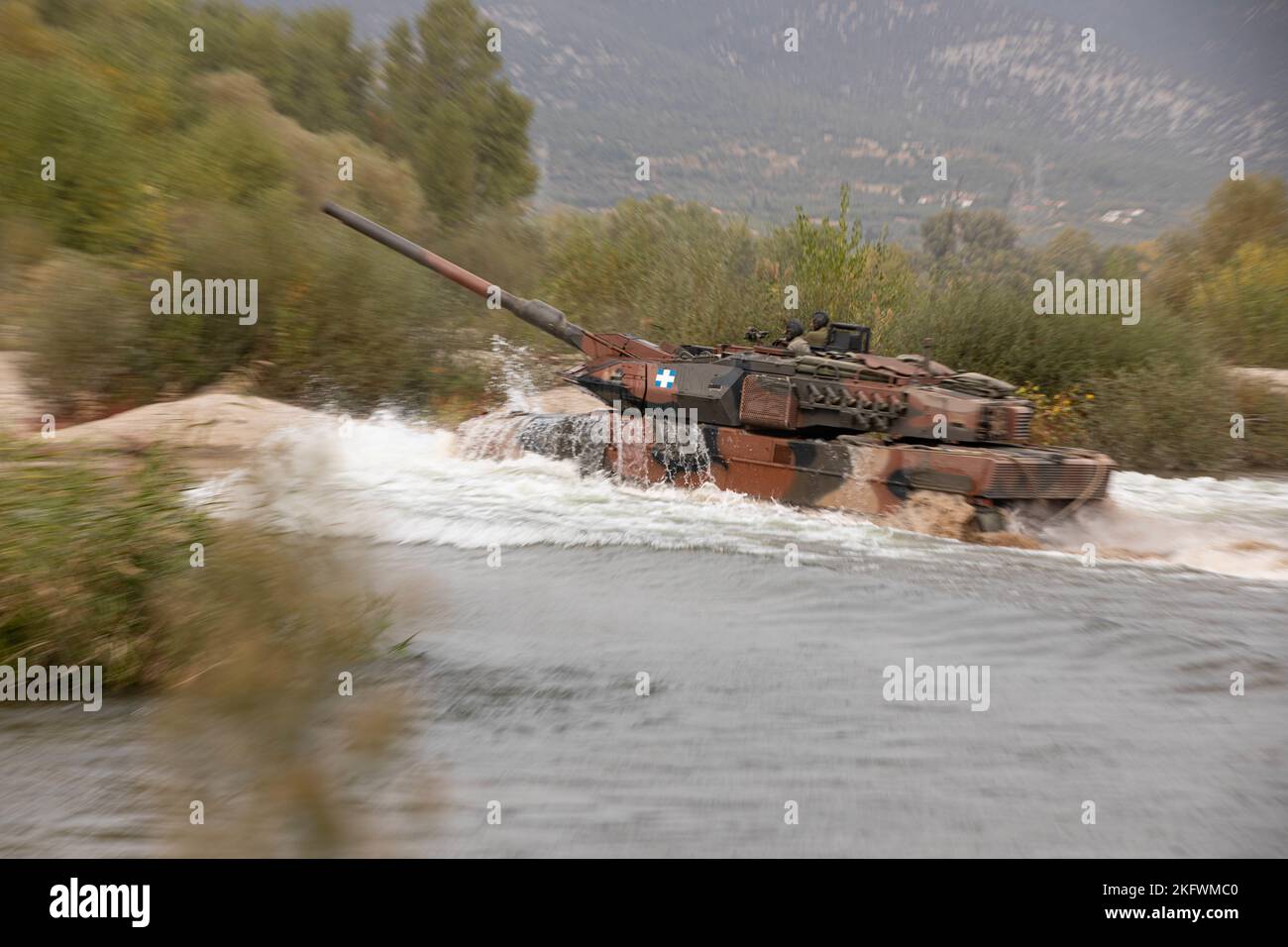 A Leo2 A6 HEL assigned to the Hellenic XXV Armored Brigade, crosses a ...