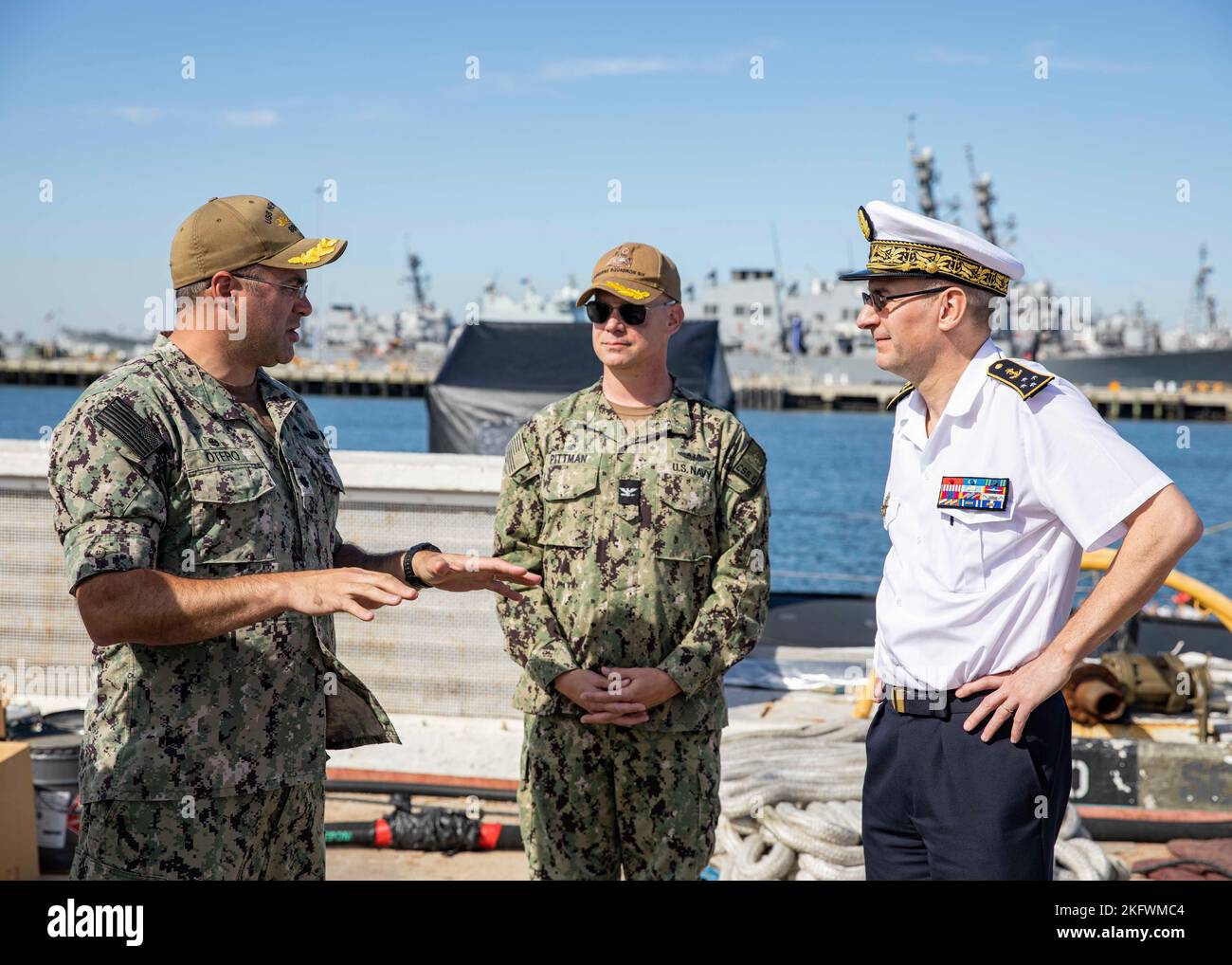 Cmdr. Carlos Otero, left, commanding officer of the Virginia-class fast ...