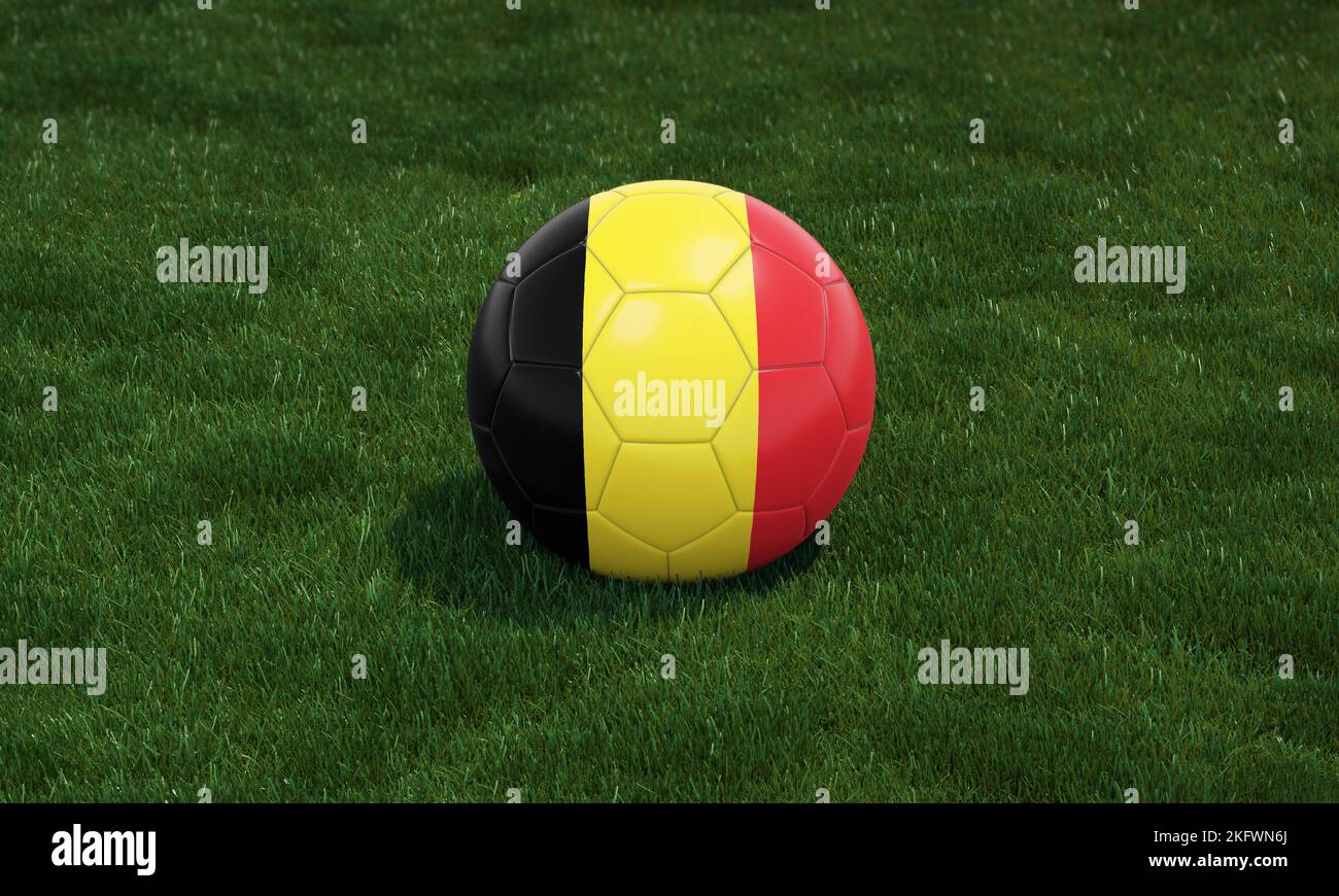 Soccer ball with Belgium flag colors at a stadium on green grasses ...