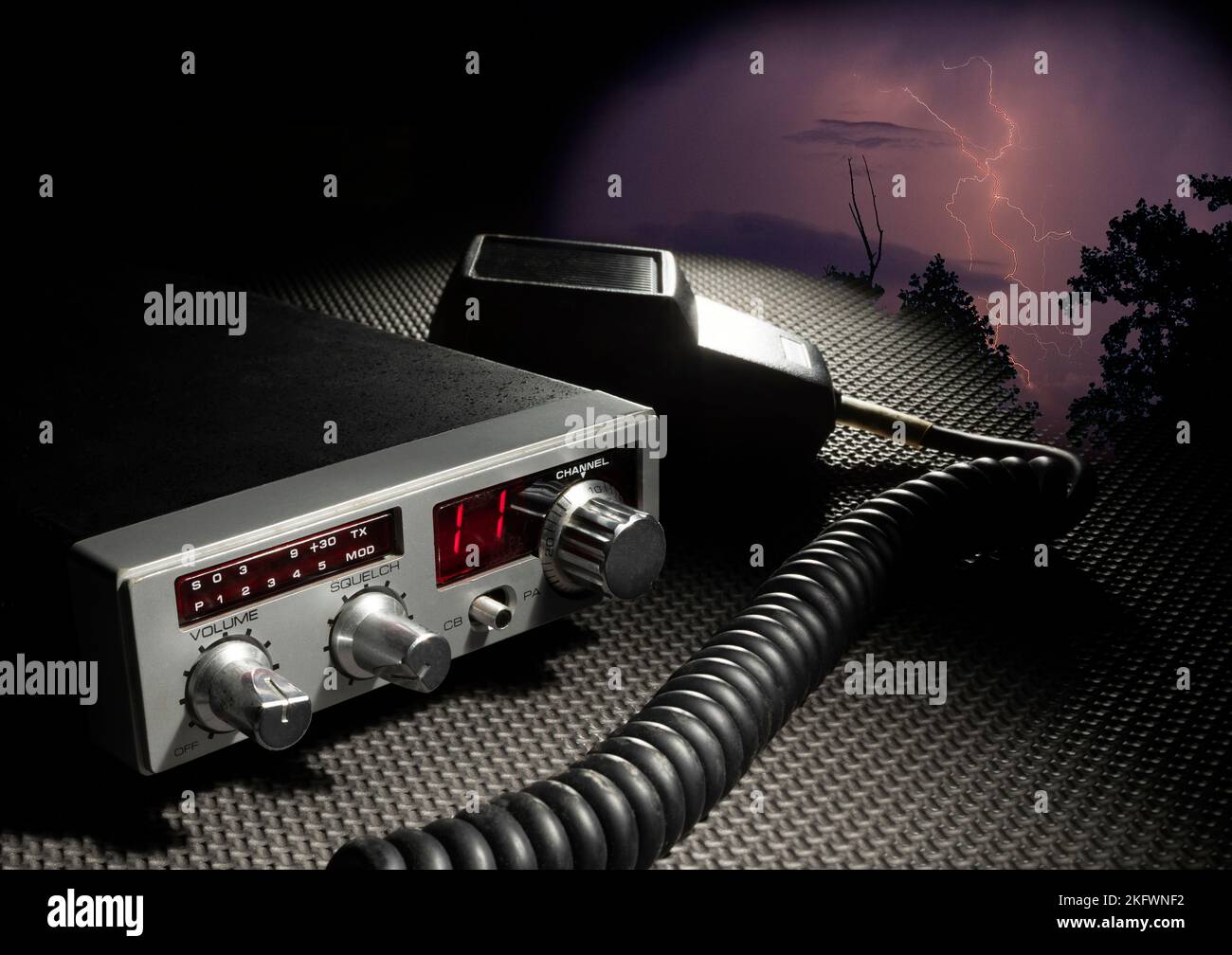 Storm behind a survival two way radio and mike Stock Photo - Alamy