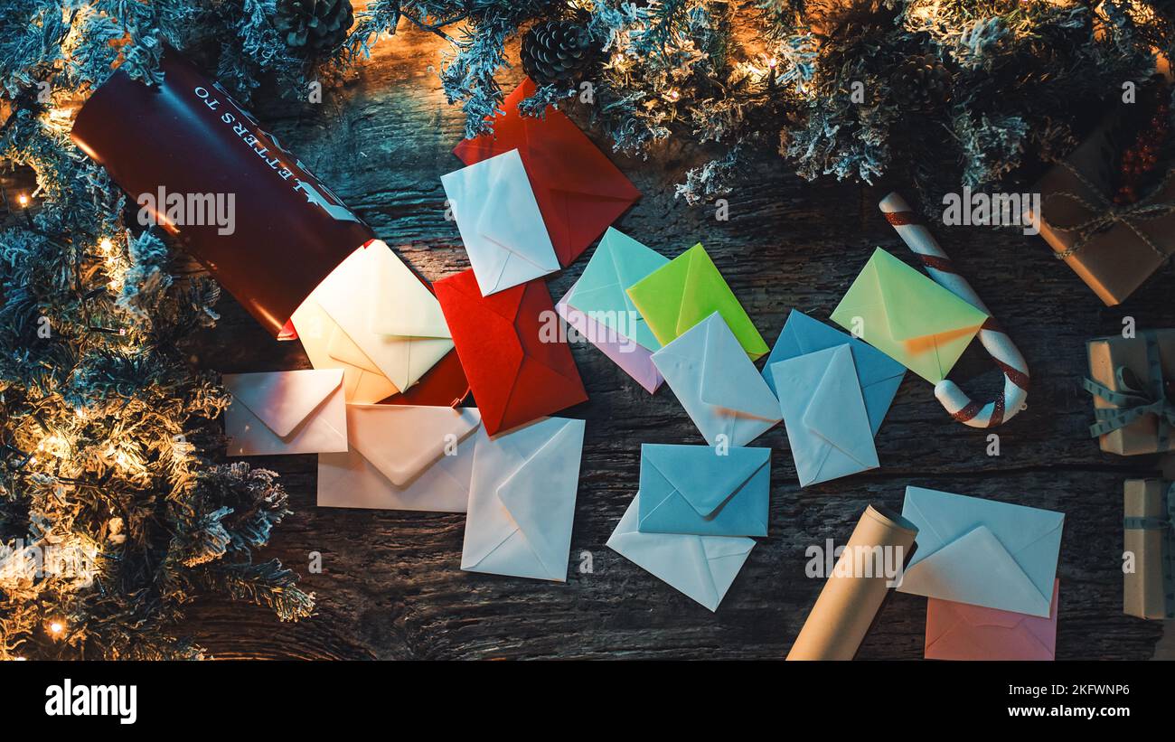 Colorful Christmas Letters Under Tree Stock Photo - Alamy