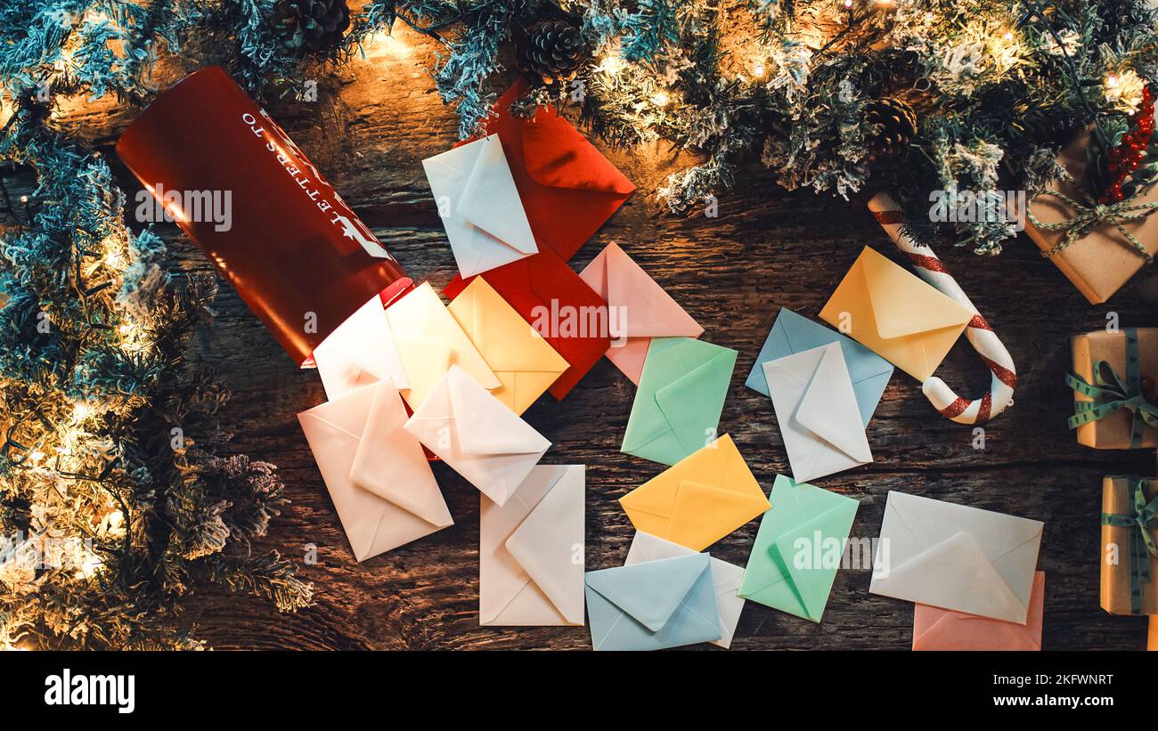 Colorful Christmas Letters Under Tree Stock Photo - Alamy