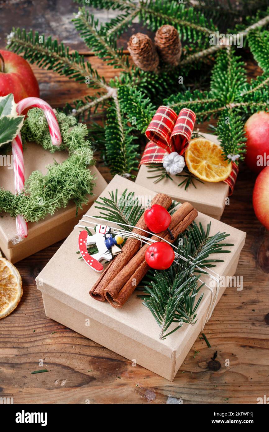 Wrapping christmas presents. Festive time Stock Photo - Alamy
